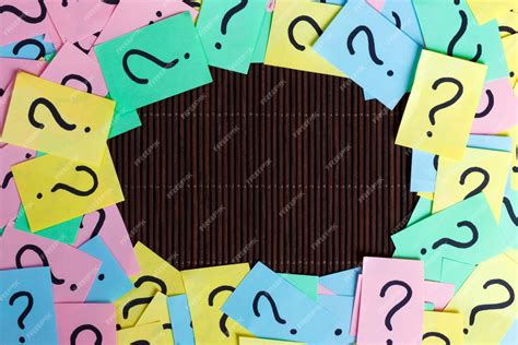 Premium Photo Close Up Of Question Marks On Colorful Adhesive Note At Table