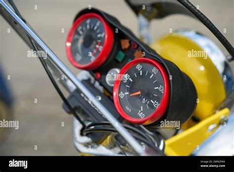 A Close Up Shot Of A Sport Bike Dashboard With An Analog Speedometer