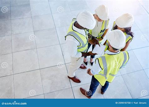 Architecture Construction And Engineering Team Planning A Creative Blueprint Of A Building On A