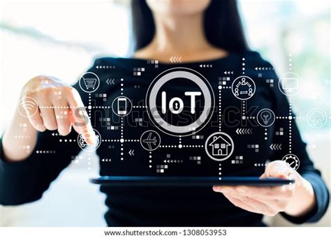 Iot Theme Woman Using Her Tablet Stock Photo Edit Now 1308053953