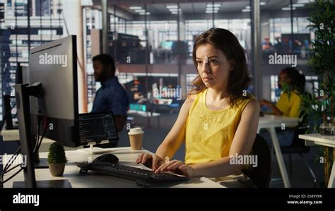 Portrait Of Smiling Programmer Creating Machine Learning Models That Can Process And Analyze