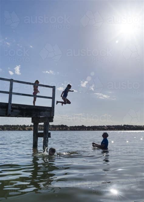 Image Of Jetty Jumping Austockphoto