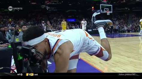 Devin Booker crashes face-first into announcers table - Stream the Video - Watch ESPN