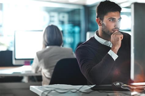 Premium Photo Thinking Business And Man On Computer In Office For Reading Email Research And
