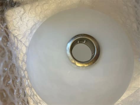 Glass Orb Angular Base Wall Sconce Stylish And Contemporary Lighting