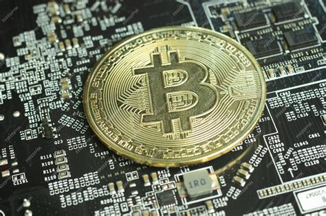 Premium Photo Bitcoin Cryptocurrency On Motherboard Electronic