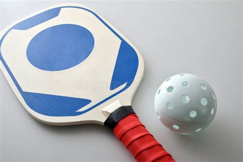 Detail Of Pickleball Racket And Ball Isolated On White Table Stock Image Image Of Ball Blue