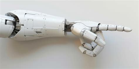 an index finger is pointed by a robot hand and gestured isolated on a