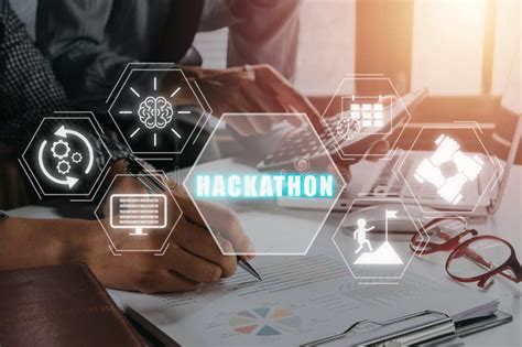 Business Team Using Laptop Computer On Desk With Hackathon Icon On Virtual Stock Image Image