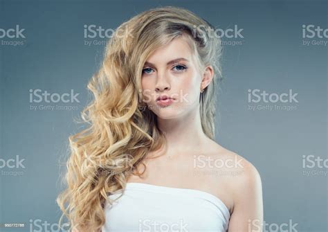 Young Nice Blonde Girl With Long Curly Fly Blonde Hair Woman Healthy