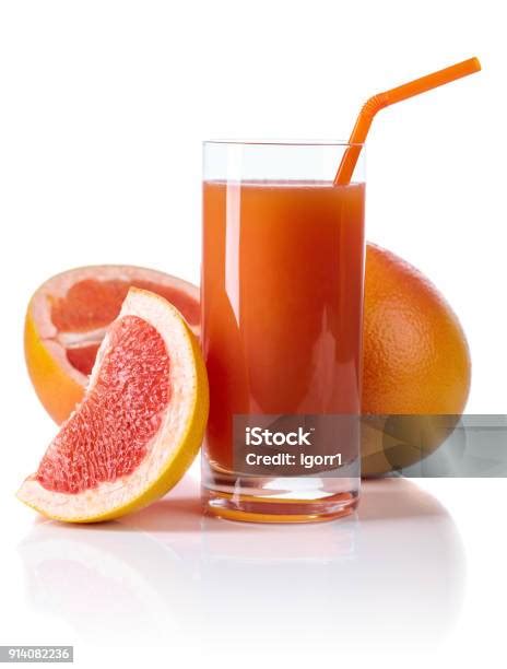 Vaso De Jugo De Toronja Fresco Y Corte Las Frutas Fondo Blanco Foto De