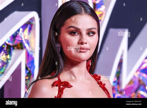 NEWARK, NEW JERSEY, USA - SEPTEMBER 12: American singer and actress Selena Gomez wearing a ...