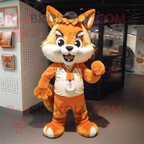 Orange Bobcat Mascot Costume Character Dressed With A Culottes And Coin