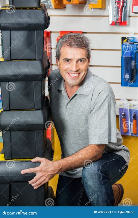 Man Lifting Stacked Toolboxes Hardware Shop Stock Photos Free Royalty Free Stock Photos From