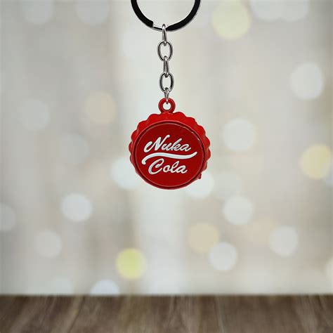 Металевий брелок Nuka Cola Ядер Кола Fallout фото відгуки характеристики в інтернет