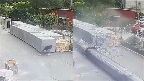 Video Narrow Escape As Falling Crane In China Almost Crushes Man