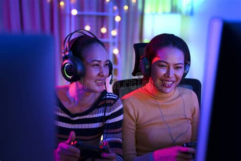 Asian Woman Gamer Play Online Game With Joystick And Computer Stock Photo Image Of Smart Girl