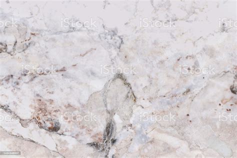고해상도의 흰색 회색 대리석 질감 배경 실내 장식을위한 고급 이음새가 없는 반짝이는 패턴으로 천연 타일 돌 바닥의 상단보기