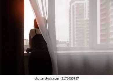 Woman Bored Looking Out Window Sexy Stock Photo 2173455937 Shutterstock