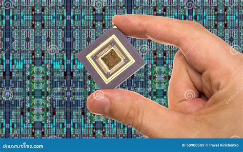 microprocessor in hand and chip layout stock image image of