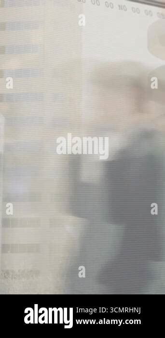 Binary Code Animation Overlaying People Working In Office Building Technology Digital