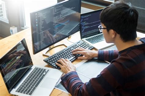 Premium Photo Programmer Coding Software Development Working Project It
