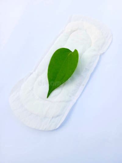 Betel Leaf On Top Of Sanitary Pad Isolated On White Background