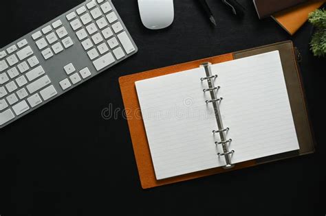 Black Modern Workspace With Blank Notepad Keyboard Mouse And Potted