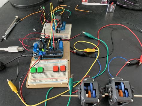 Arduino Uno With MShield Version 1 Controlling 2 Dc Motors And 1