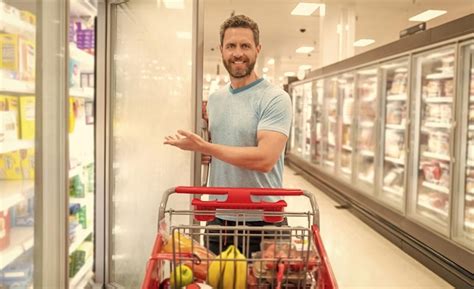 Premium Photo Customer Consumer With Purchases Guy At Grocery Store