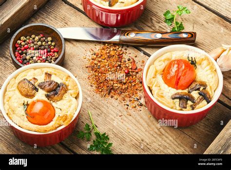 Tomato Tart With Mushroom Cheese And Cherry Toamtoes On Rustic Wooden