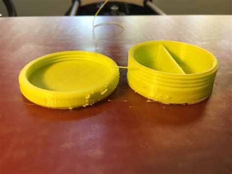 How Can I Prevent These Blobs Of Filament On The Side Of My Print