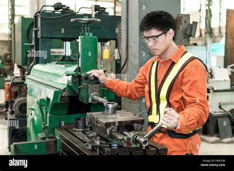 Mechanical Engineering control lathe machine in factory Stock Photo - Alamy