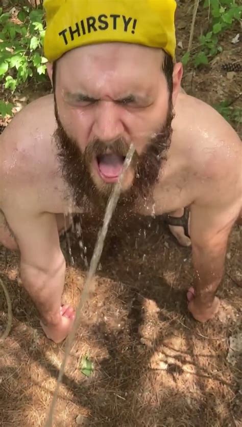 Muscle Bearded Faggot Gets Peed On