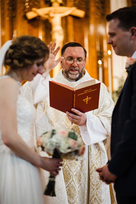Catholic Wedding Mass Priest Blessing Bride And Groom Church Alter