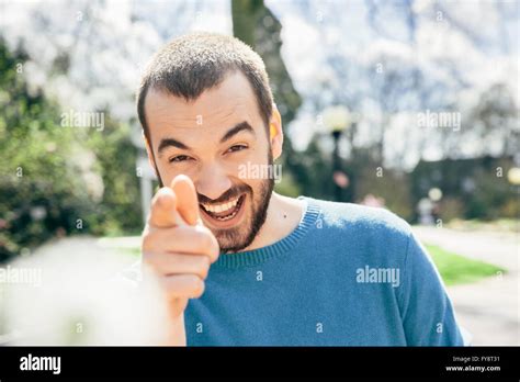Laughing Man Pointing On Viewer Stock Photo Alamy