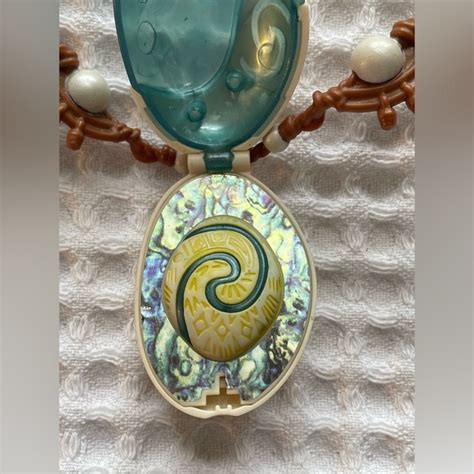 Disney Accessories Disneys Moana Shell Necklace Opens To Reveal The Heart Of Tefiti Poshmark