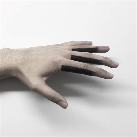 Black Finger Tattoos