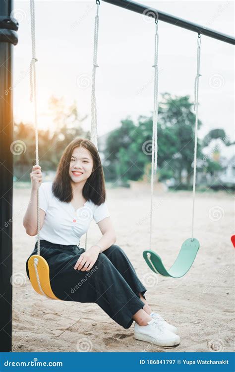 Asian Girl Enjoy Playing Toys In The Playground Stock Image Image Of