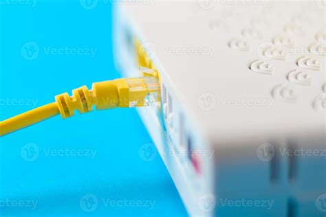 Internet Modem Router Hub With A Cable Connecting On Blue Background 6842523 Stock Photo At Vecteezy