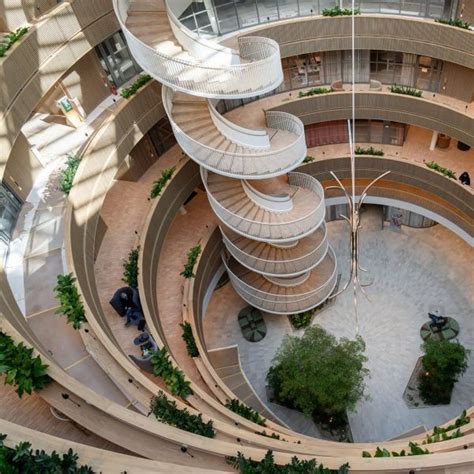 Spiral Staircases Dezeen Circular Escalator 3 Story Spiral