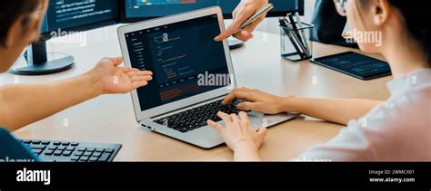 Two Smart Cooperative Computer Engineers Working Together As Teamwork