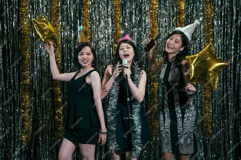 Premium Photo Young Ladies Singing And Dancing On The Stage In The