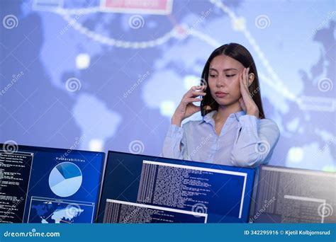 Concerned Female Cybersecurity Manager In Enterprise Cyber Security