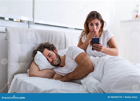 Jealous Wife Spying The Phone Of Her Partner While He Is Sleeping In A