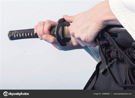 Hand Holding Sword