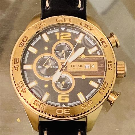 Fossil Mens Black And Gold Watch Depop
