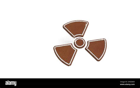 3d Rendering Of Gingerbread Cookie In Shape Of Symbol Of Radiation Sign Isolated On White