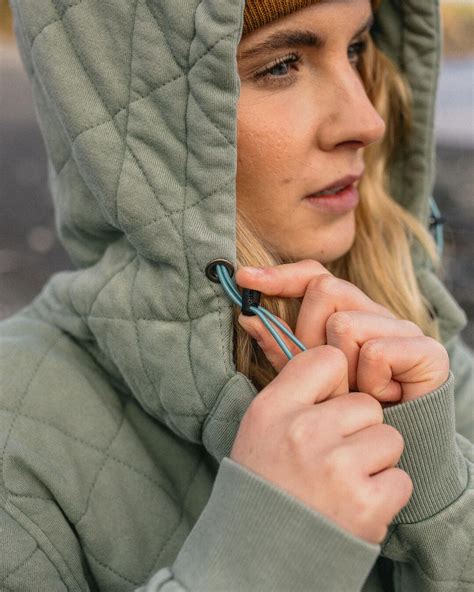 Clementine Recycled Quilted Popper Up Hoodie Pistachio Passenger