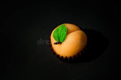 One Peach With Green Leaf Shaped Candy Made From Marzipan Stock Image Image Of Confectionery